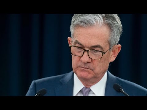 Stocks close mixed after Fed's comments on interest rates and economic recovery