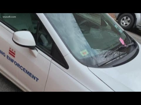 DC parking enforcement car with a ticket on it. How?!