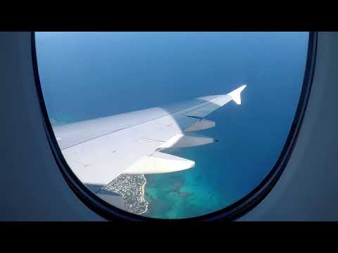 Emirates EK701 flying over MAURITIUS and landing at Sir Seewoosagur Ramgoolam International Airport