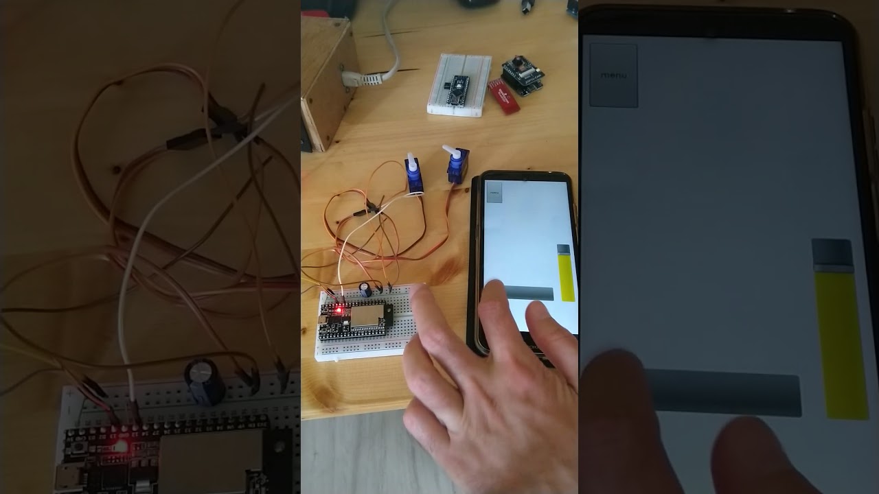 Controlling 2 #servomotors over WiFi with #esp32 WROVER-B and 2 sliders in #RoboRemo app.