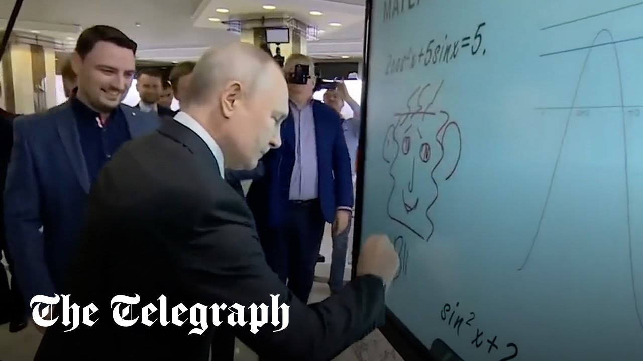 Putin draws smiley face during rare public walkabout
