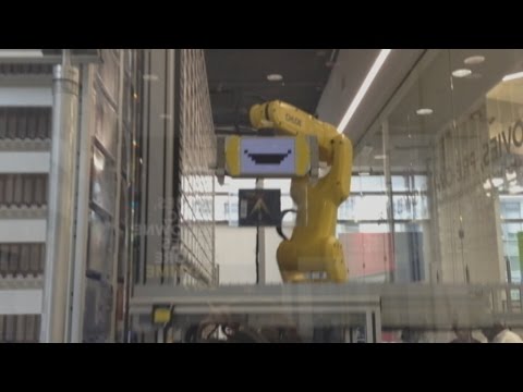 A Robot at Best Buy Sells CDs, DVDs, Games