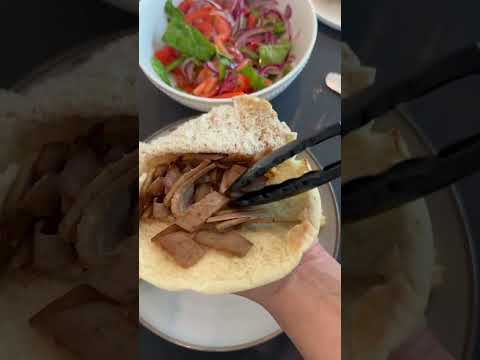 Greek style vibes in every bite! Juicy gyro meat, zesty onions #greekflavors #greekfood