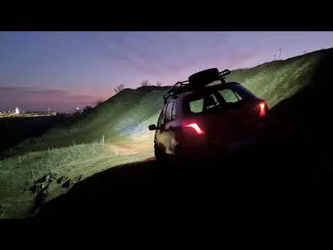 Toyota Yaris offroad on slippery mud