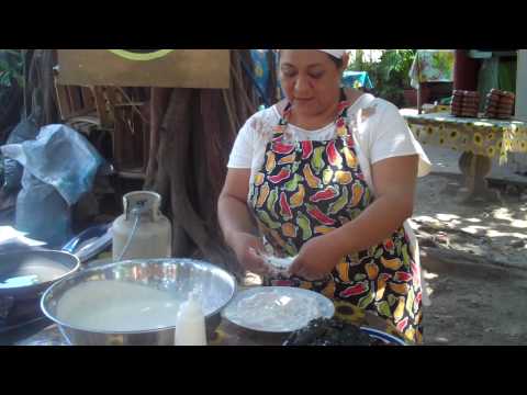 Monica cooking chili rellenos in Zihuatanejo