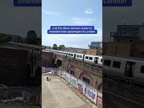 Just Eat driver delivers water to stranded train passengers in London