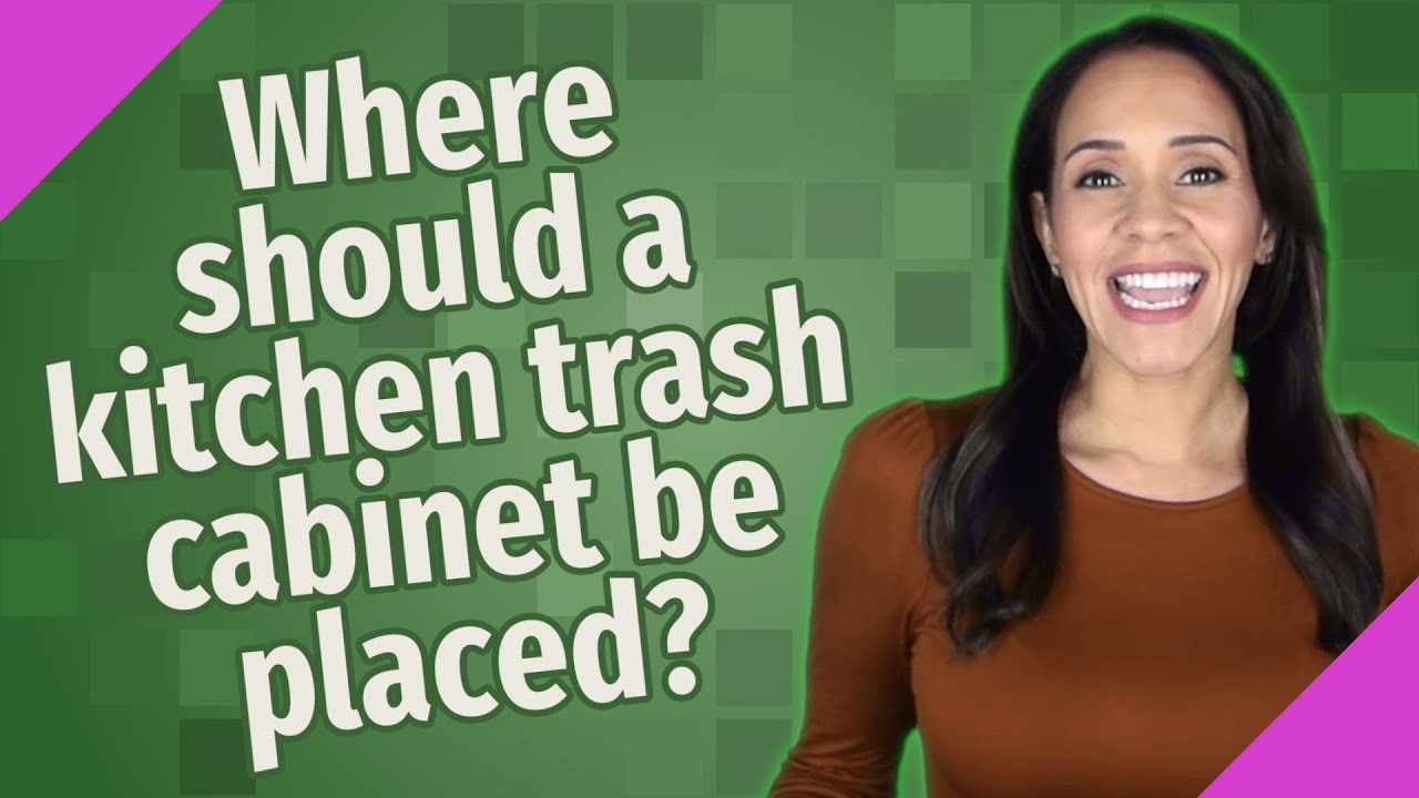 Where should a kitchen trash cabinet be placed?