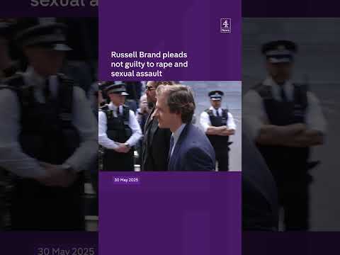 Russell Brands pleads not guilty to rape