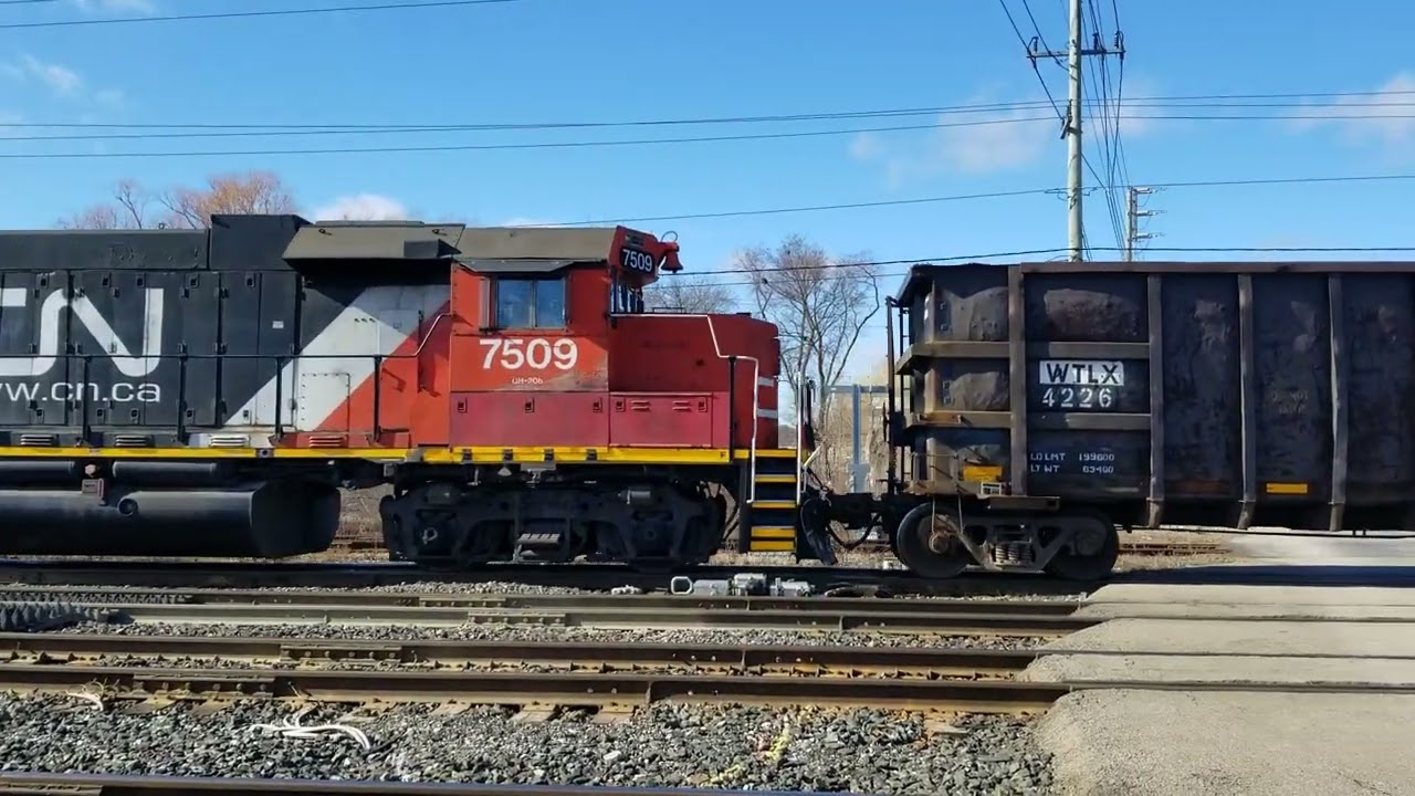 CN L554 EMD GP40-2L 9461 & GP38-2 7509 Backing up the Freight Train in Oakville CN Yard