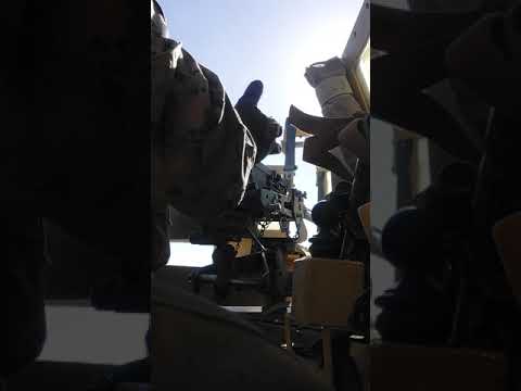furry in the military shoots a 50. cal machine gun #short