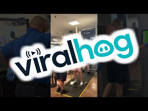 TSA Agent Makes Man Do the Robot || ViralHog