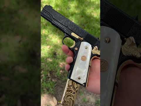 1911 engraved gun with pearl grips
