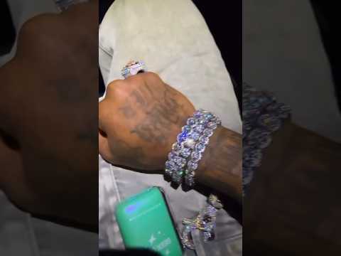 NBA Youngboy shows off his diamonds