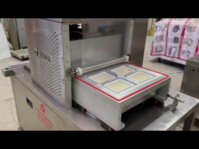 Tray Sealer Machine - Kaju katli sweet packing machine Manufacturer ...