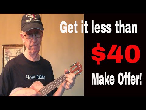 Buy a Kmise tiger flame okoume ukulele for less than $40? Make Offer!