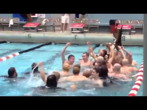 MG jumps in UW Natatorium pool to celebrate 2015 WIAA D2 state boys swimming/diving title