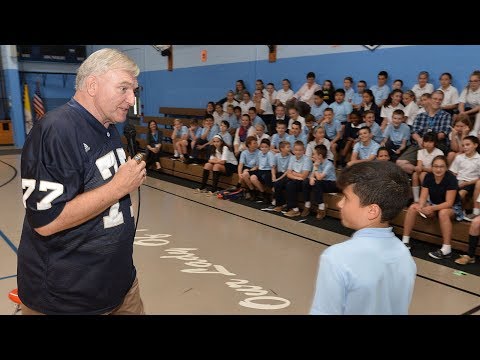 Erie native, NFL veteran Mike McCoy visits local Catholic schools