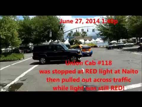 Union Cab 118 stops, then runs red light, SW Columbia & Naito