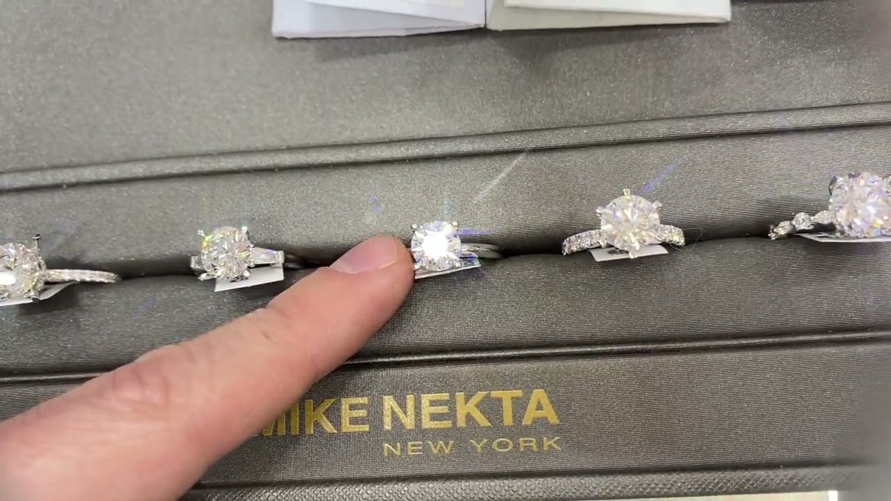 Comparing round diamond engagement rings 2 carat  4.10 Carat