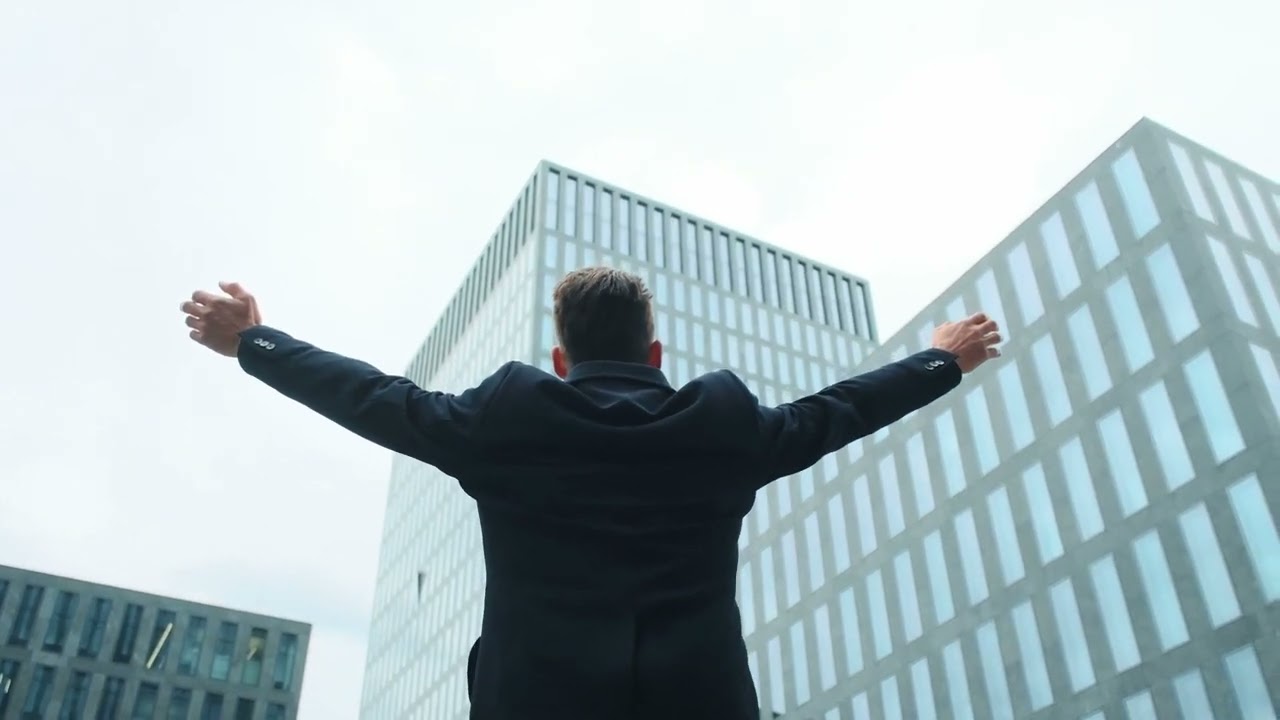 business man celebrating success back view of businessman with arms raised up stand SBV 336064317 HD