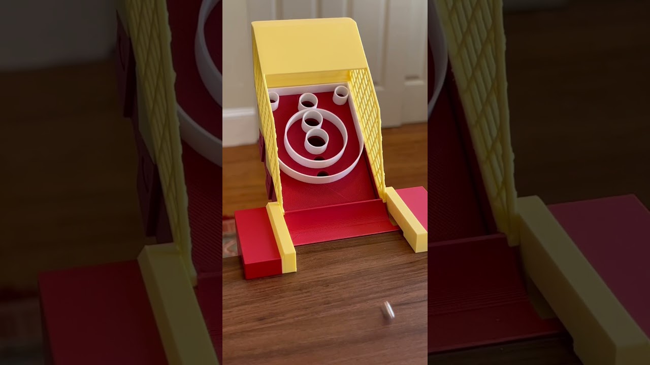 I made a Desktop SkeeBall Game. STL files are available at the link in my bio #3dprints