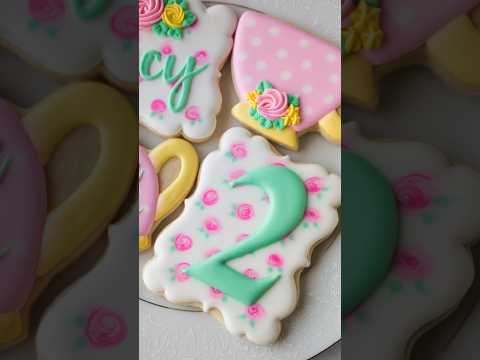 Cookie decorating tutorial for wet on wet roses made with royal icing #cookiedecorating #royalicing