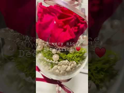 A very beautiful Rose in the wine glass.