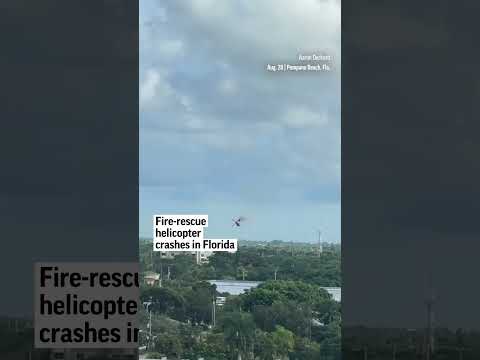Watch as a rescue helicopter crashes in Pompeo Beach, Florida