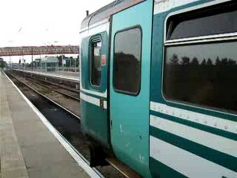 British Rail Class 153 | 153335 "Michael Palin" Departs Cambridge