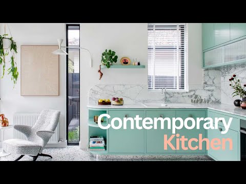 The Mint Green Kitchen interior design adds a colorful element to this brick home