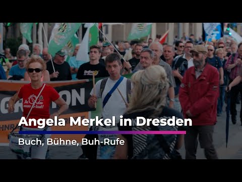 Angela Merkel in Dresden: Buch, Bühne, Buh-Rufe