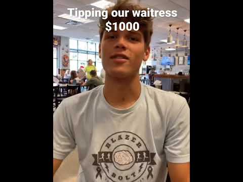 Tipping our waitress $1000!