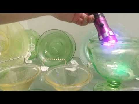 Mall booth of Vaseline Glass, Glowing Glass. Green & Yellow Glowing #reseller #glass #antique