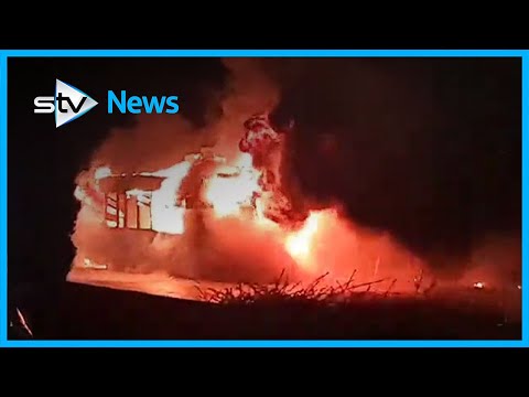 Bus bursts into flames as firefighters tackle blaze