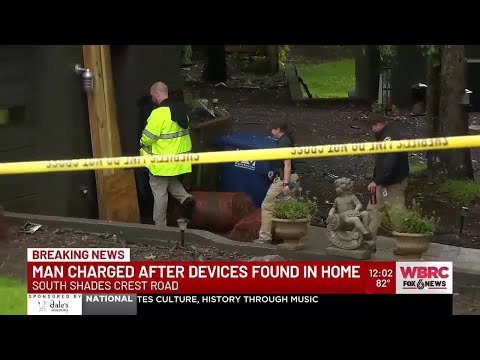 Man charged after devices found in home