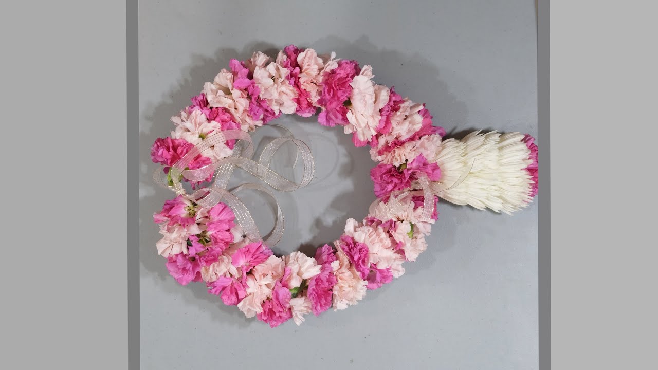 How to string a fresh flower garland with carnations and spider mums