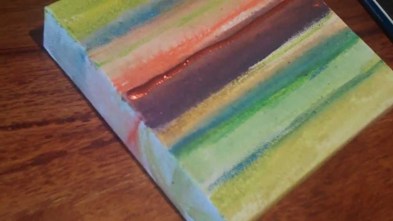 Abstract painting on canvas using derwent inktense blocks