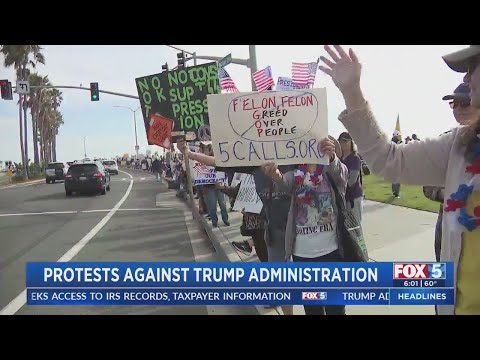 Hundreds in San Diego protest Trump's orders and federal layoffs