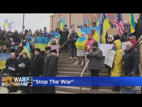 Crowd Gathers In Ukrainian Village To Protest Attack By Russia