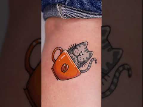 Rawcat in coffee cup by @ rawcat.ttt