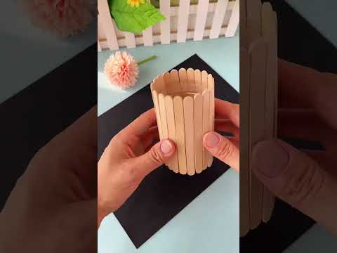 Don't throw away the popsicle sticks after eating. You can make a nice pen holder for your child
