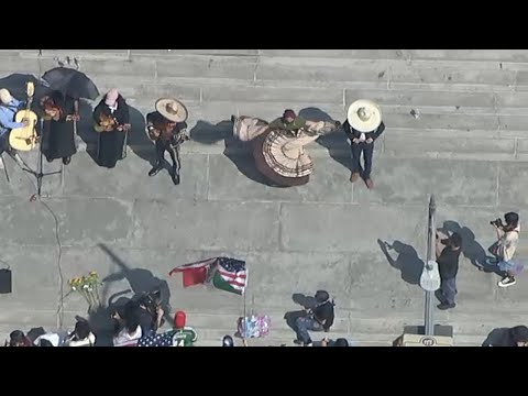 Protesters dance and play music in day 6 of demonstrations in Los Angeles