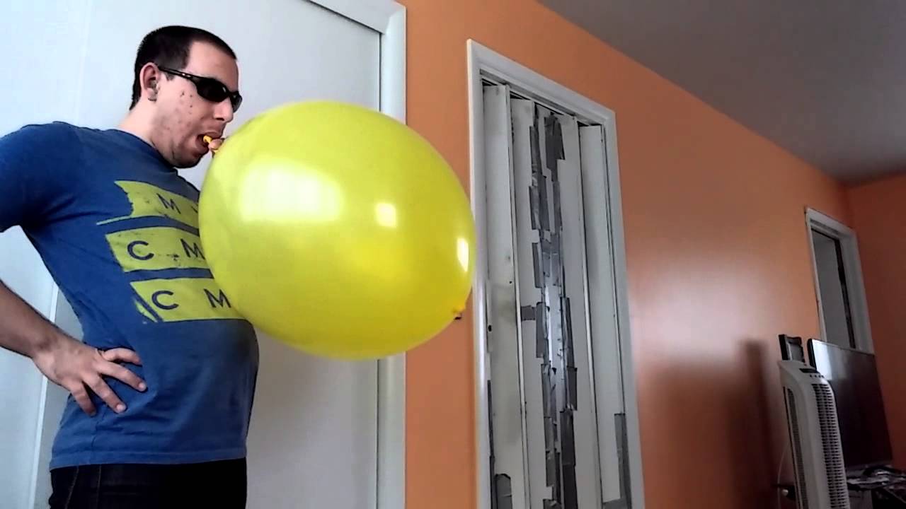 Blow to pop another different yellow punch ball balloon