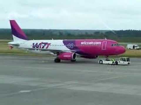 Wizzair A320 airplane pushback in Katowice airport
