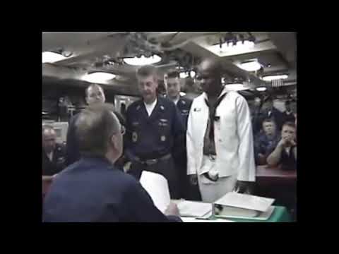 Navy Sailor at Captain's Mast with torn Dress Whites