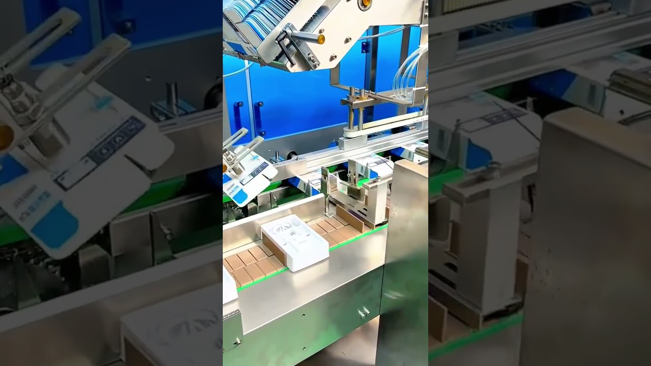 Automated packaging of electronic accessories into cardboard boxes