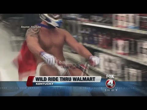 Men ride minibikes through Walmart