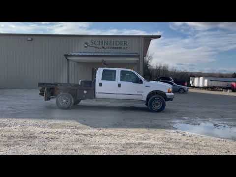 2000 Ford F350 crew cab flatbed - Schneider Auctioneers LLC