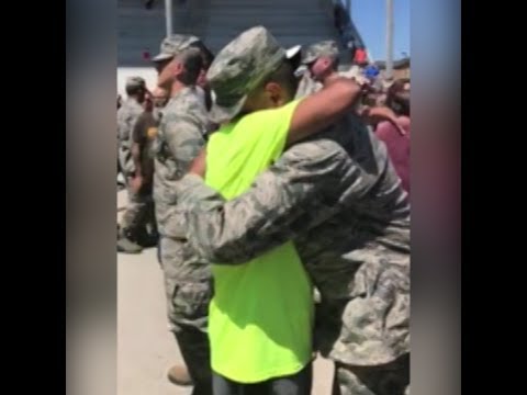 Dad gets out of wheelchair to give Airman son huge honor