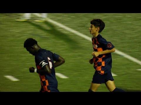 Naperville North’s Juan Hernandez curls one past the keeper